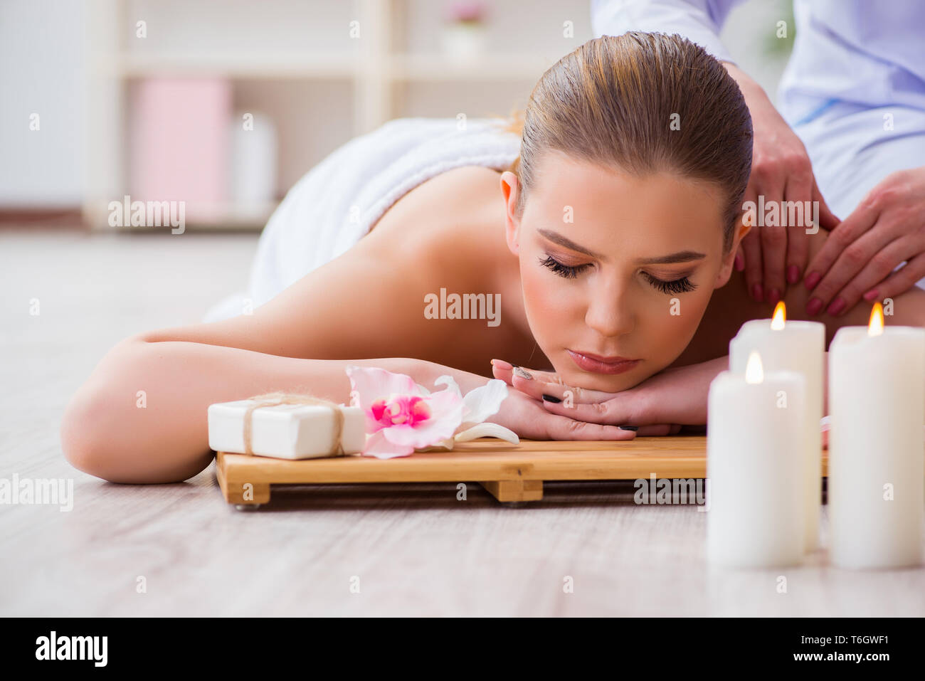 Young woman during spa procedure in salon Stock Photo - Alamy