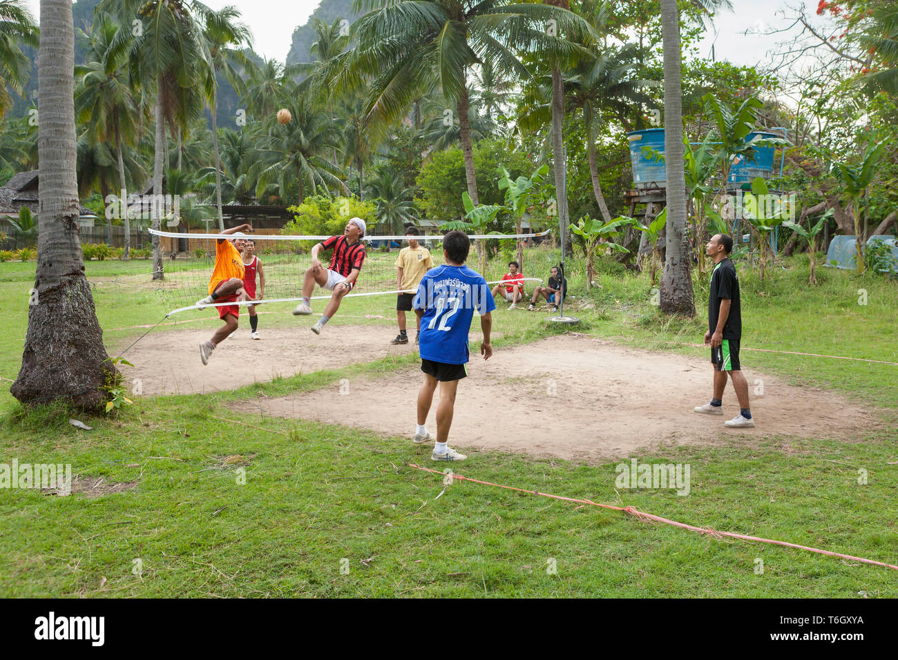 Thai men playing rattan ball game,Takraw, Thailand Stock Photo - Alamy