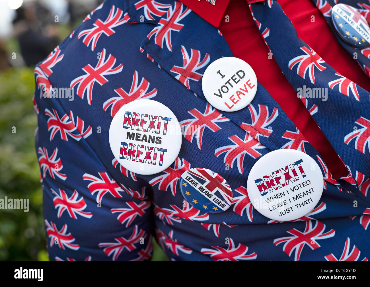 A pro-Brexit supporter displays Brexit badges on his Union Jack design ...