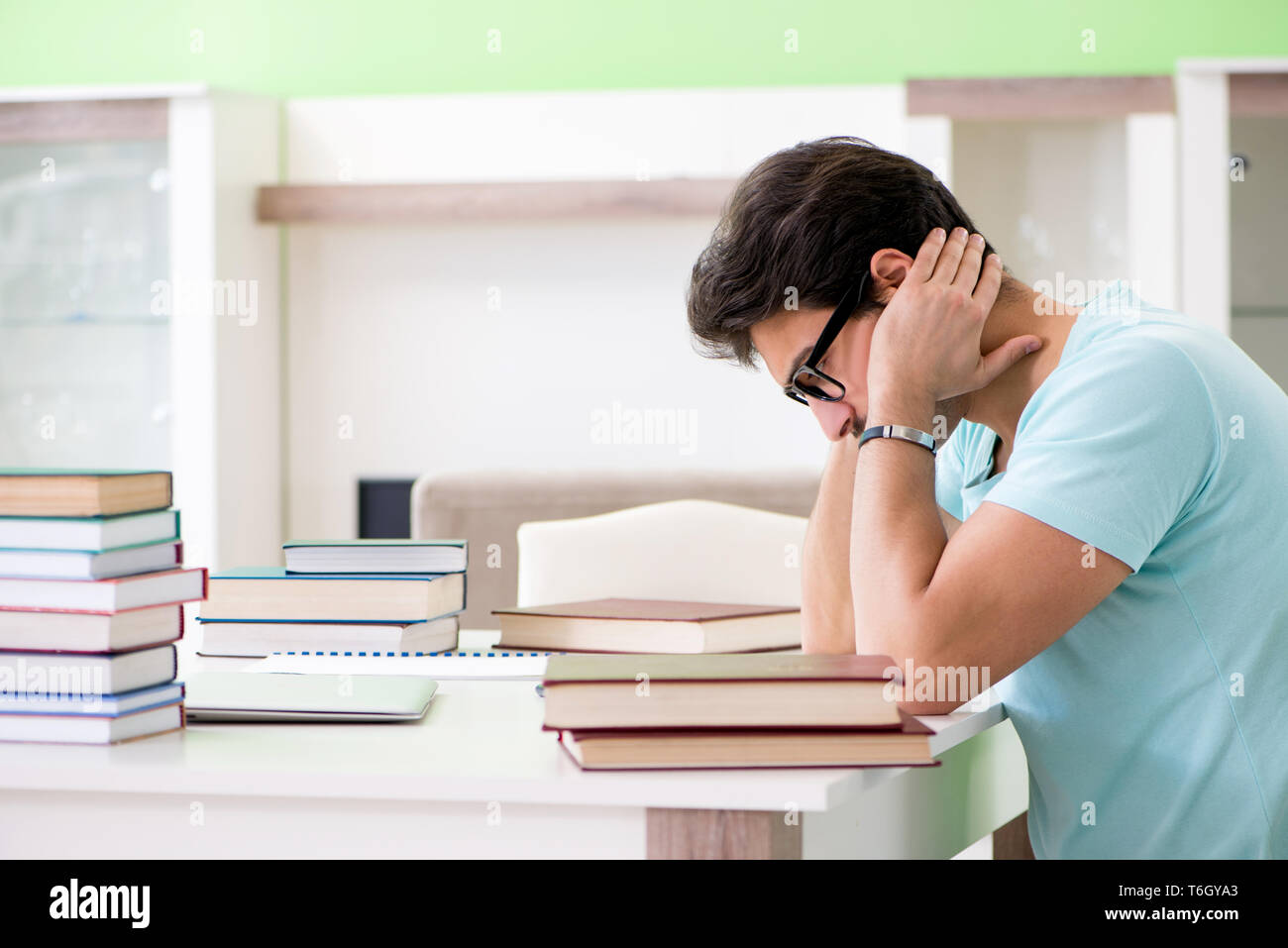 Student preparing for university exams at home Stock Photo - Alamy