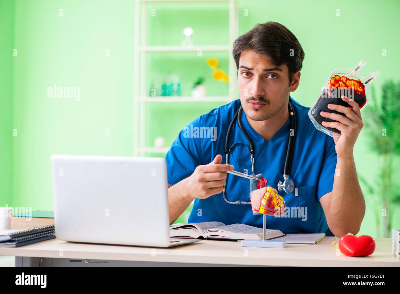 Doctor doing blood analysis in the lab Stock Photo - Alamy