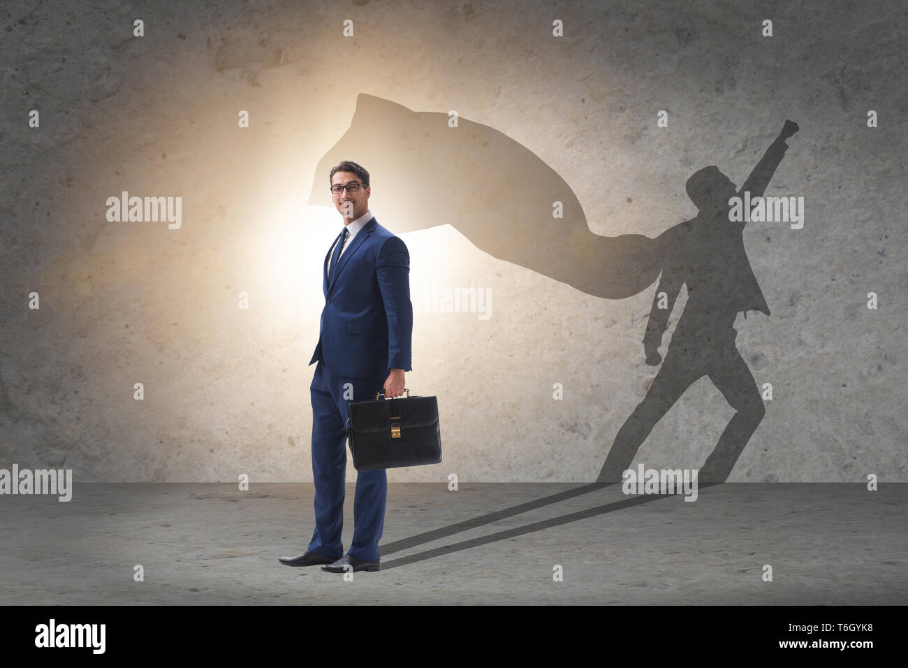 Businessman and his shadow in business concept Stock Photo - Alamy