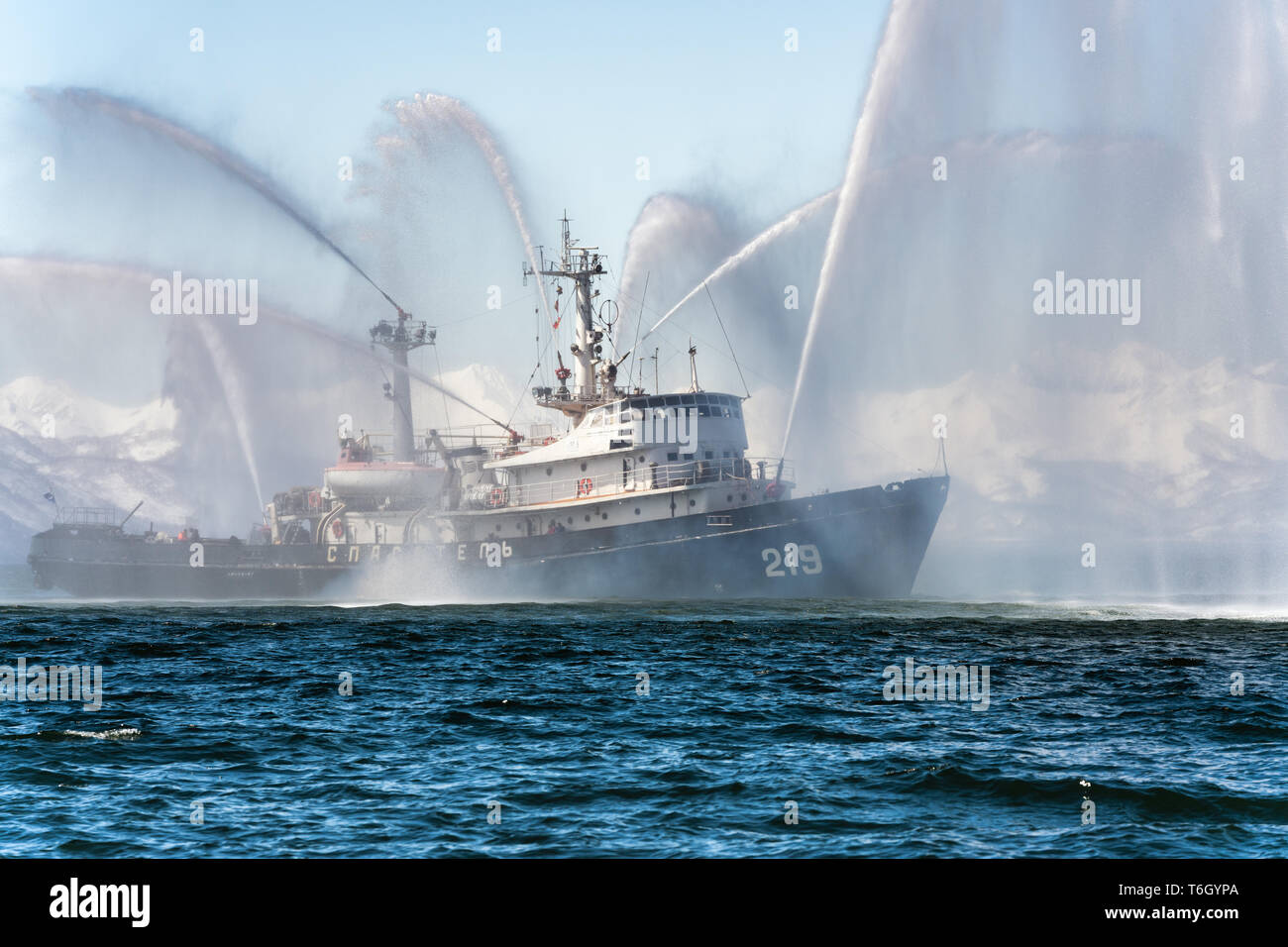 Firefighting rescue ship of Pacific Fleet of Russia spraying water on ...