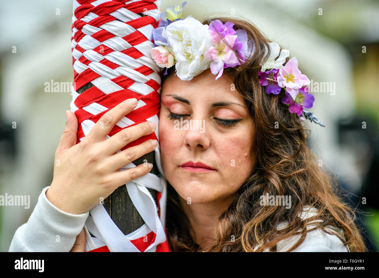 A woman silently hugs maypole hi-res stock photography and images - Alamy