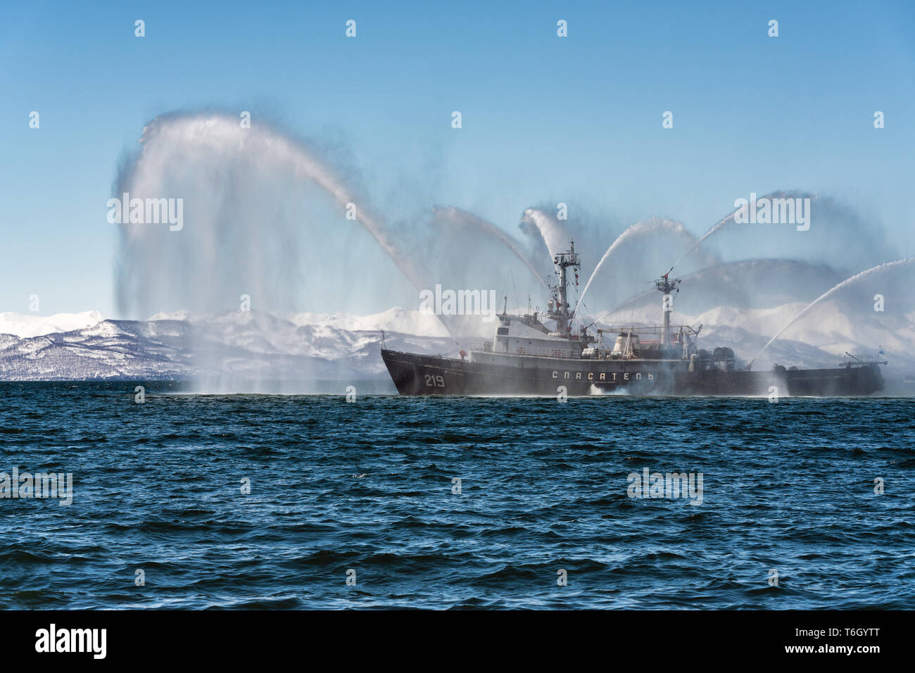 Rescue and salvage ship of Pacific Fleet of Russia spray water on sea ...