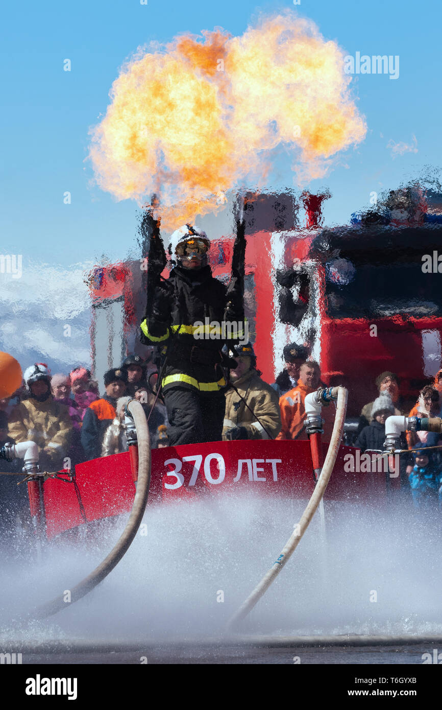 Rescue firefighter Emercom of Russia flying with flamethrowers, spewing ...