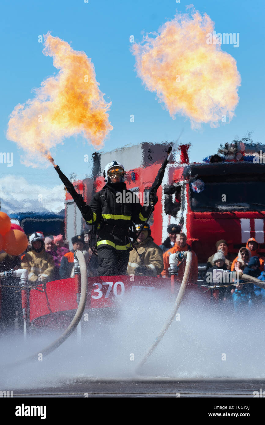 Rescue firefighter Emercom of Russia flying with flamethrowers, spewing ...