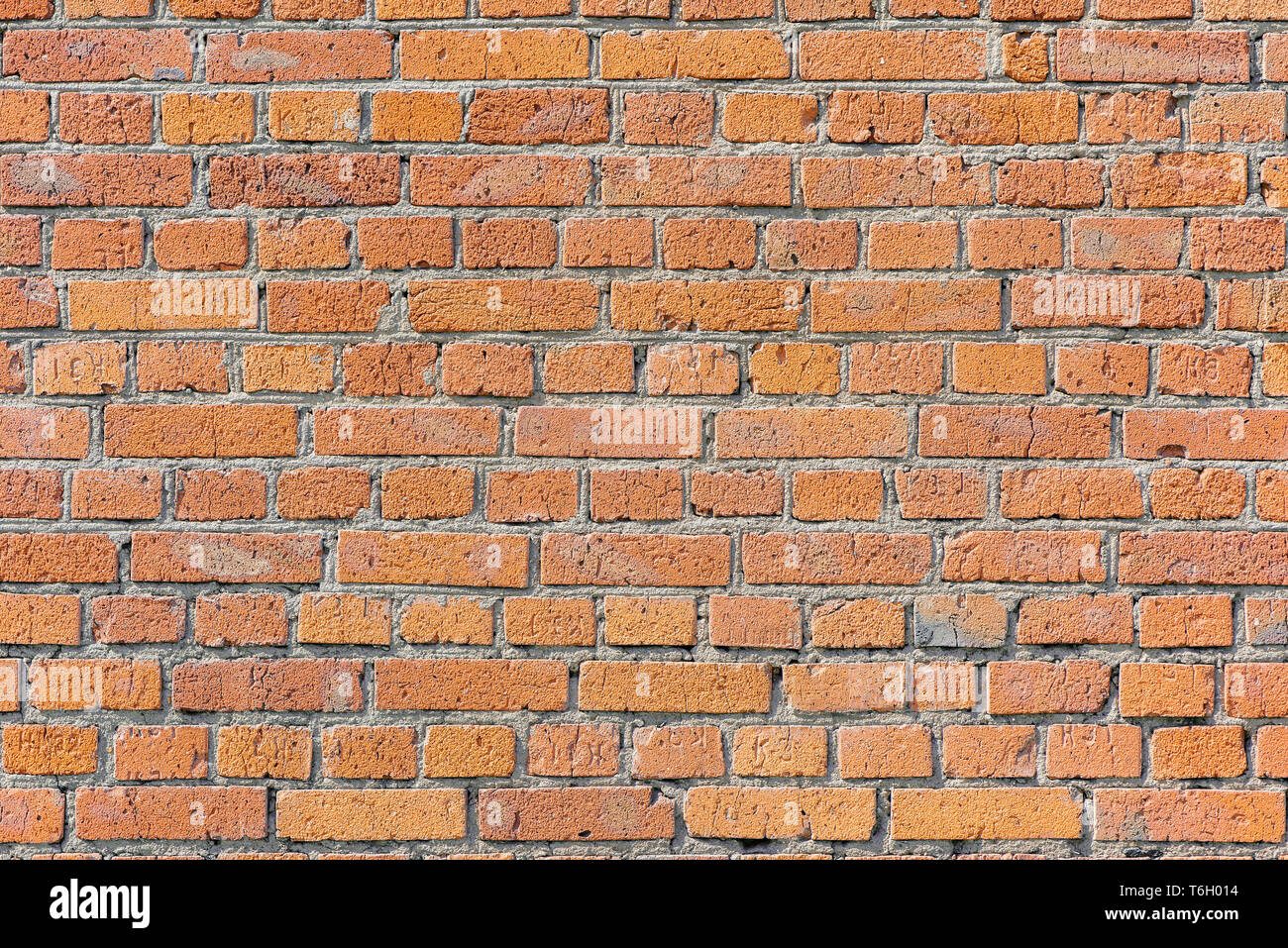 Red brick wall background inside of the room Stock Photo - Alamy