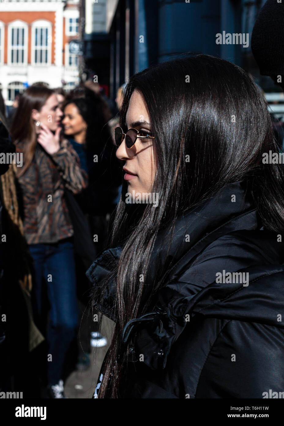 Women's profiles, Soho, London, England, UK Stock Photo - Alamy