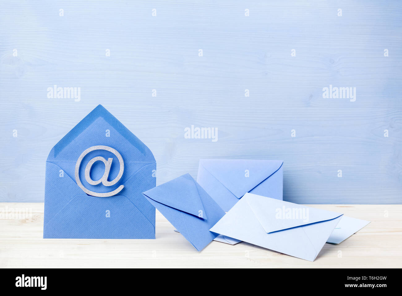 e-mail symbol on wooden background with copy space Stock Photo - Alamy