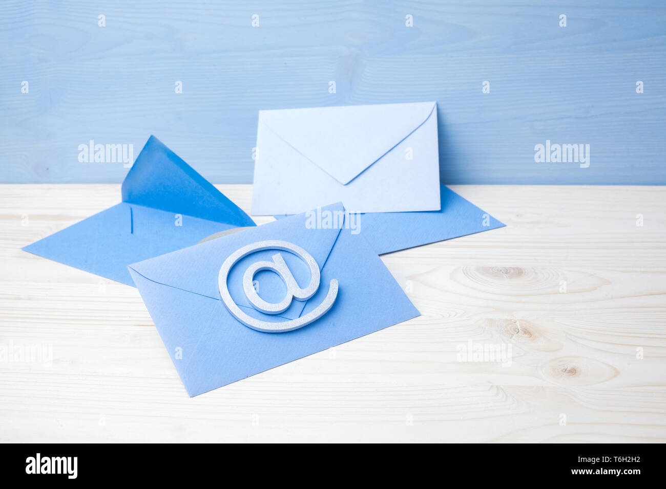 e-mail symbol on wooden background with copy space Stock Photo - Alamy