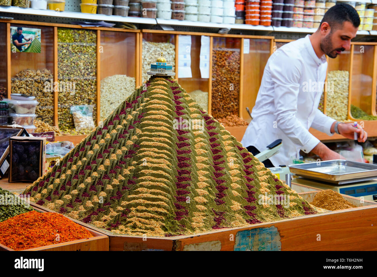 Local man is selling dried fruits and nuts at shopping street in ...