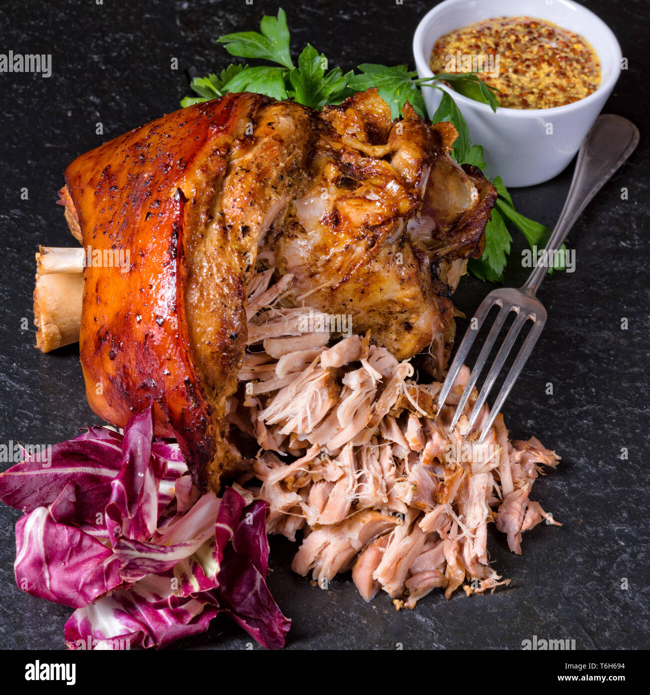 crispy fried Bavarian pork knuckle with soft meat Stock Photo - Alamy