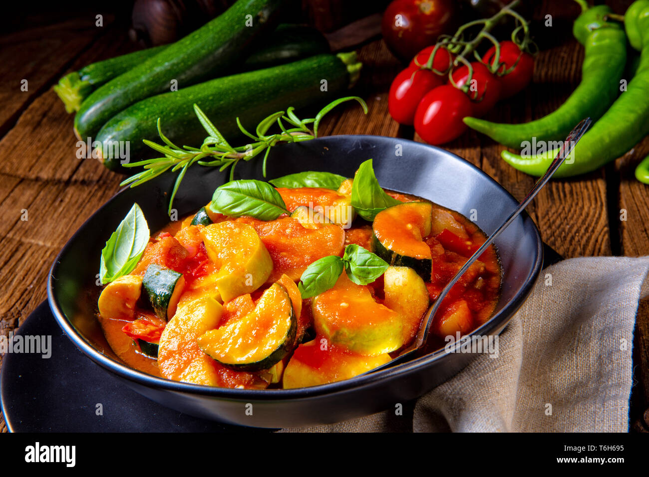 vegetarian ratatouille with fresh vegetables and herbs Stock Photo - Alamy