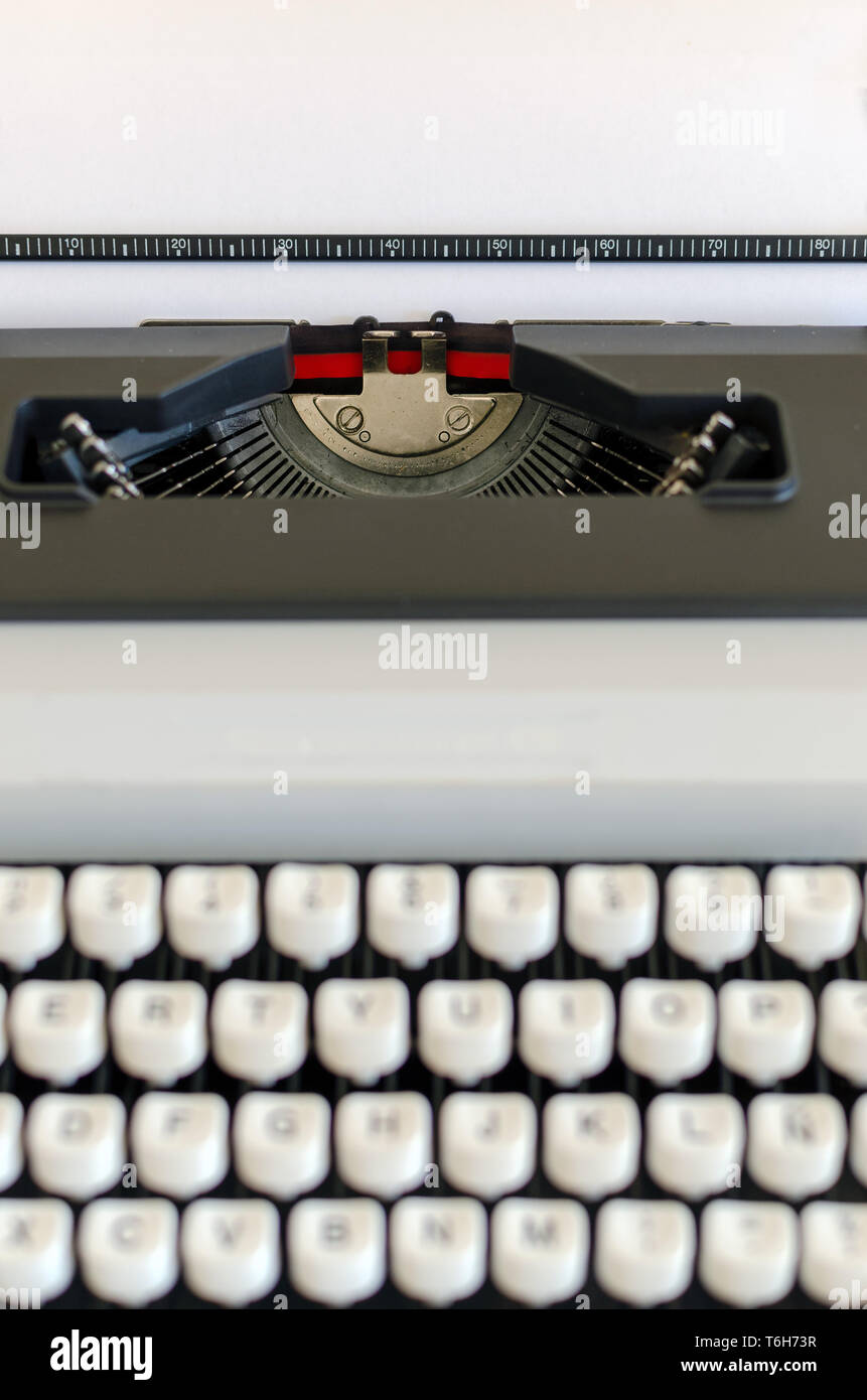 white keyboard typewriter, selective focus on the tape Stock Photo - Alamy