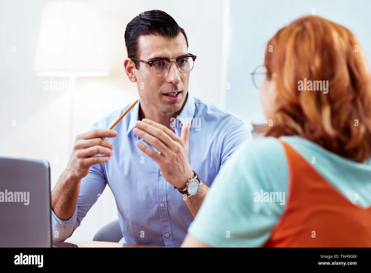 Gesticulating with their hands hi-res stock photography and images - Alamy