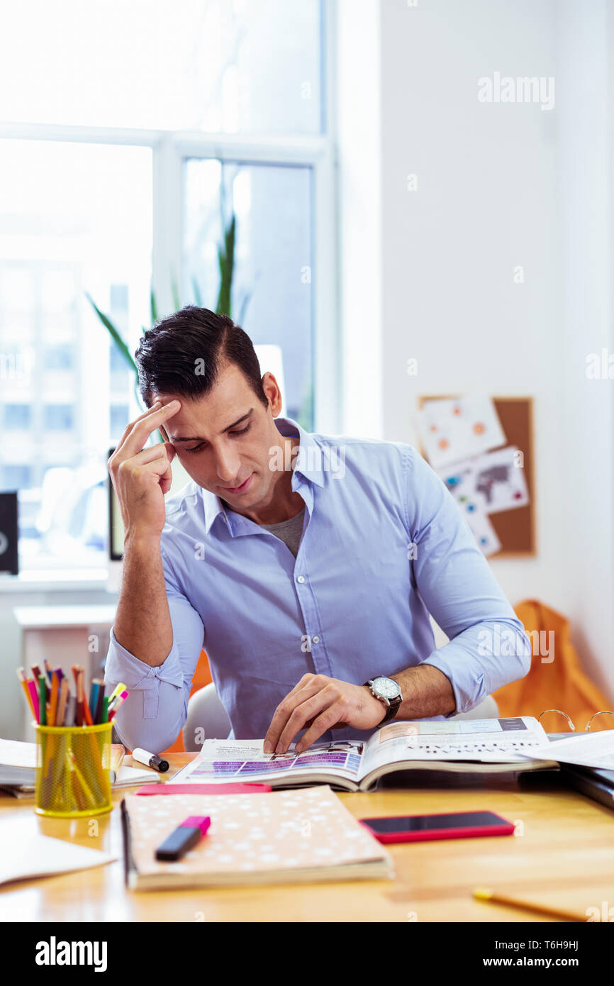 Nice smart man thinking about his task Stock Photo - Alamy