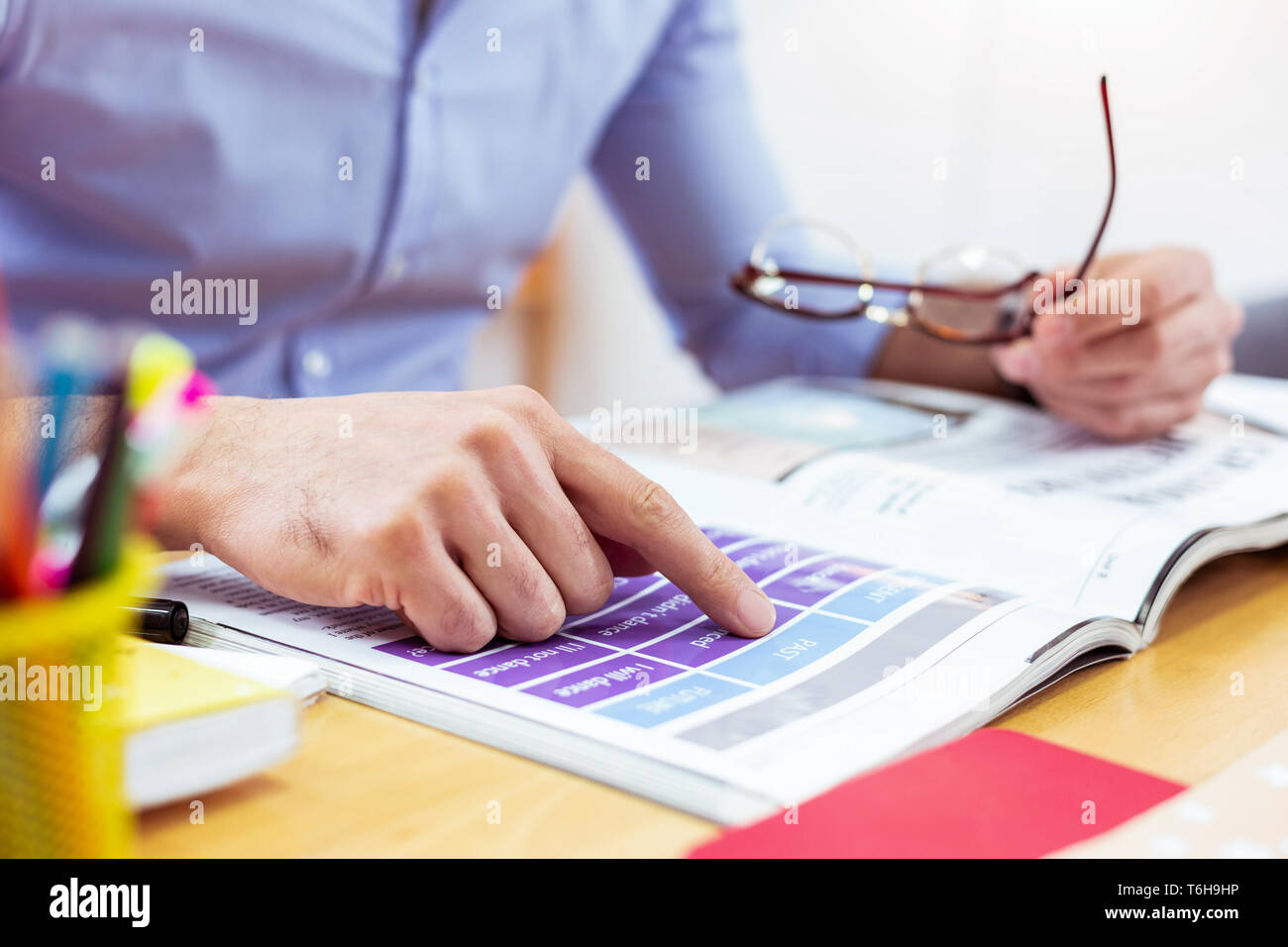 Finger on page reading hi-res stock photography and images - Alamy