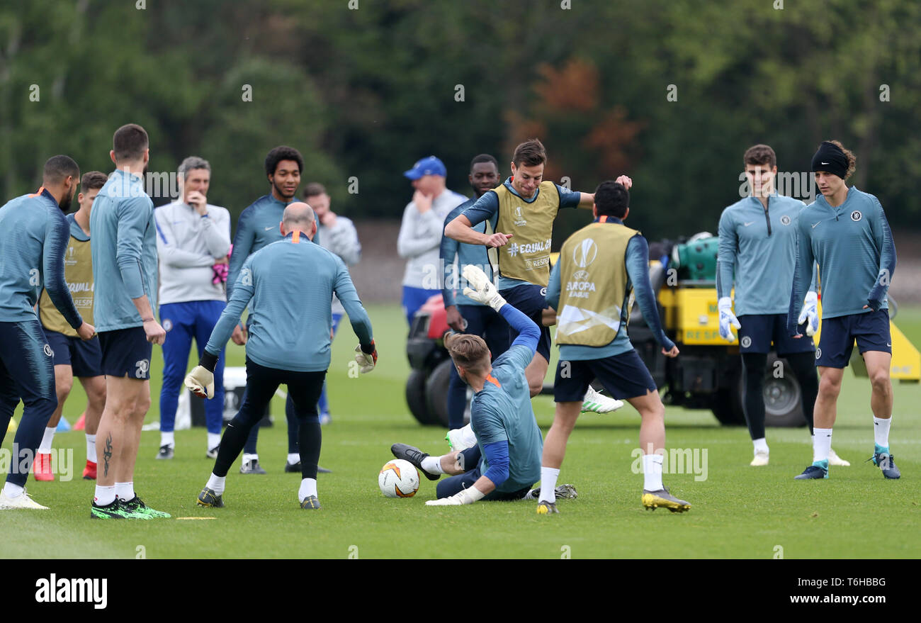 Chelsea goalkeeper Rob Green slides in on a tackle during the training ...