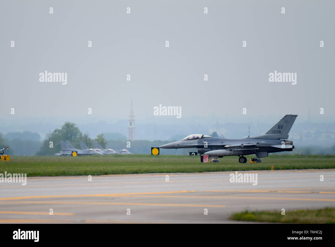 An F-16 Fighting Falcon assigned to the 555th Fighter Squadron taxis ...