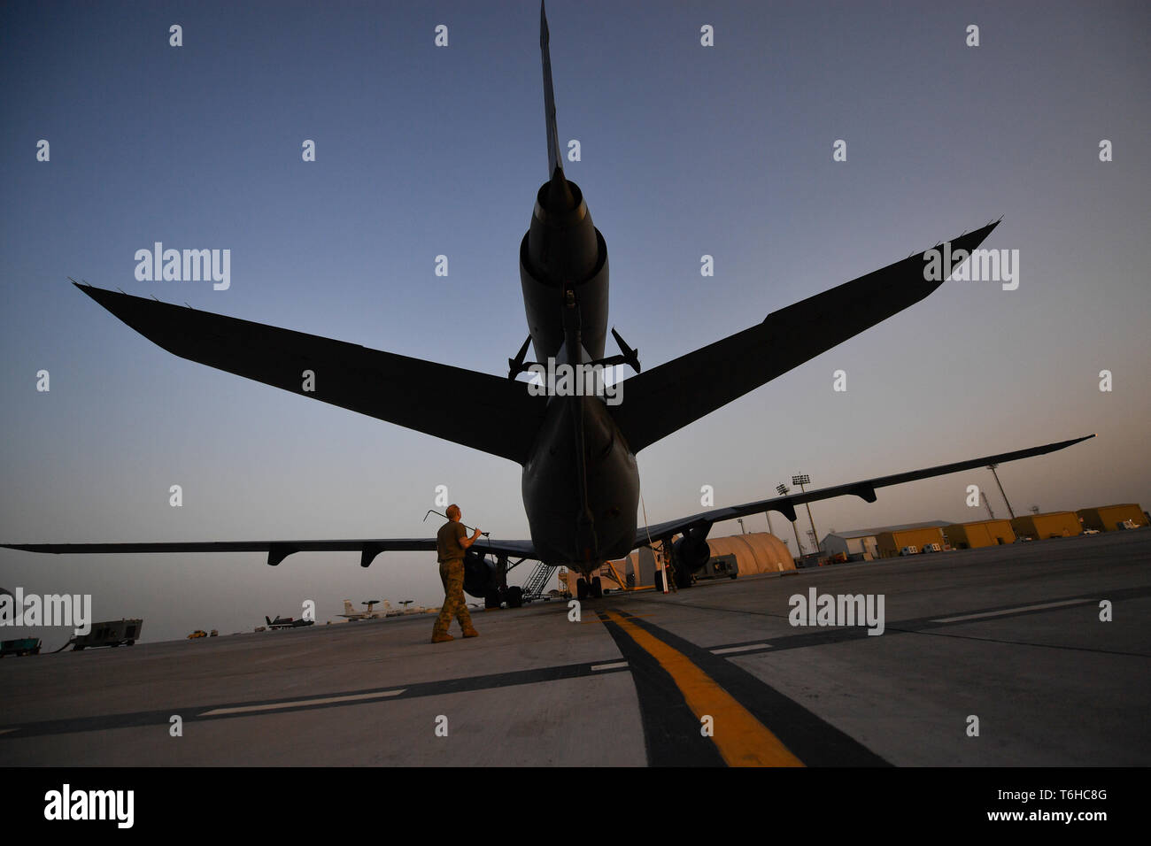 A U.S. Air Force KC-10 Extender flight engineer conducts pre-flight ...