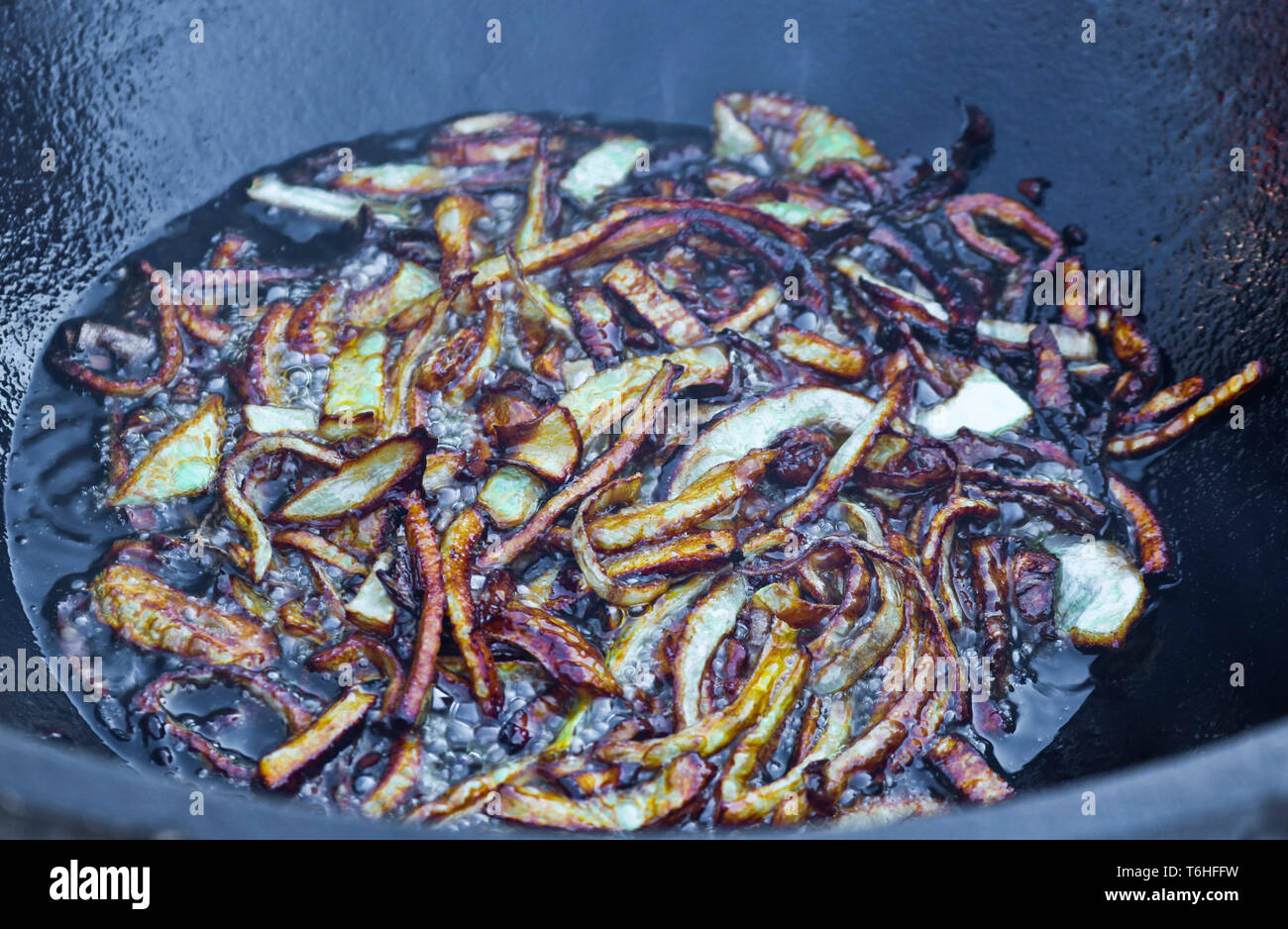 Cauldron boiling oil hi-res stock photography and images - Alamy