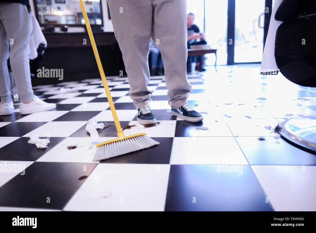 Barber cleaning floor hairdresser salon hi-res stock photography and ...