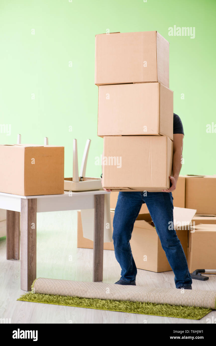 Delivery man falling stack boxes hi-res stock photography and images ...