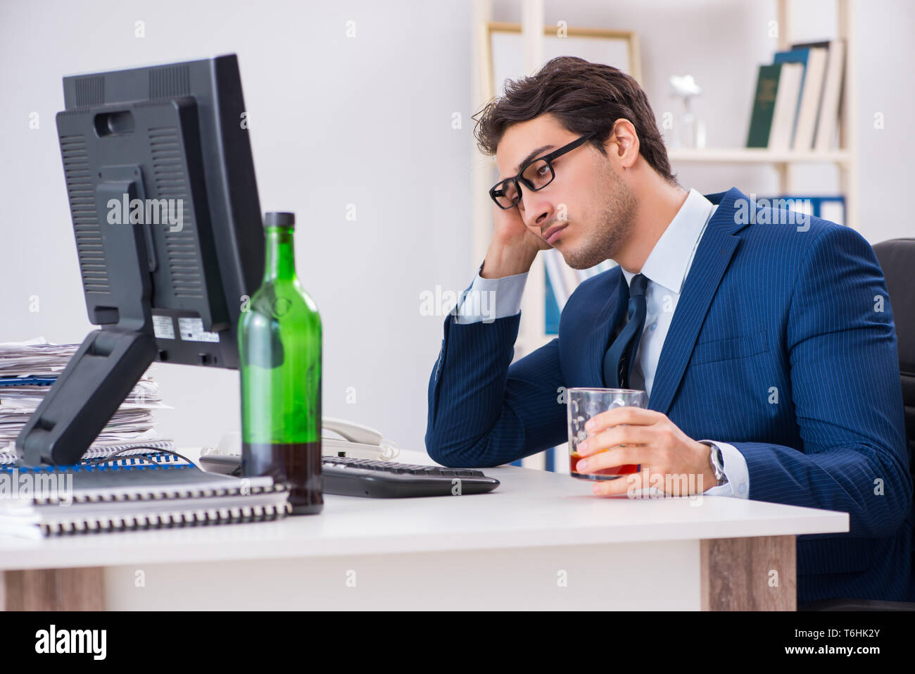 Young drunk employee in the office hi-res stock photography and images ...