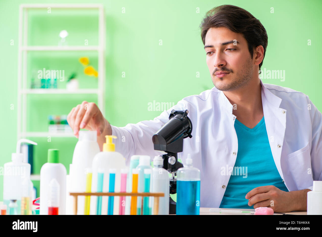 Chemist testing soap in the lab Stock Photo - Alamy