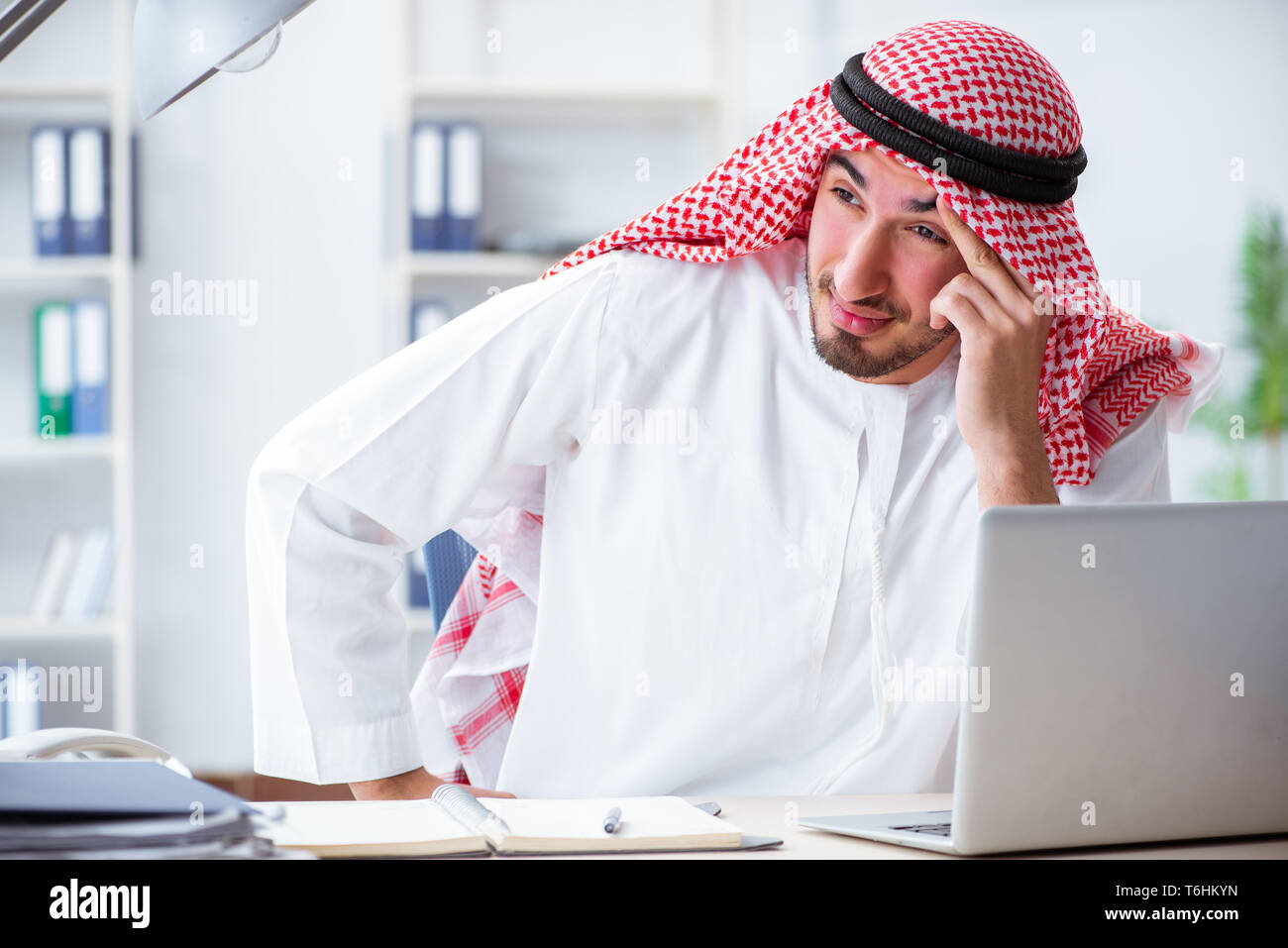 Arab businessman working in the office Stock Photo - Alamy
