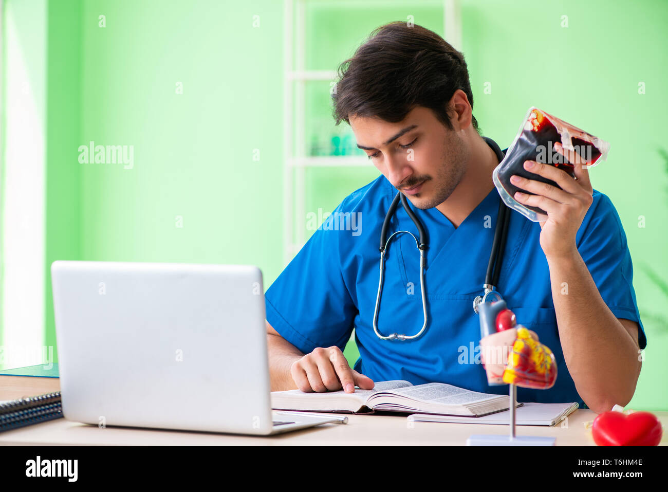 Doctor doing blood analysis in the lab Stock Photo - Alamy