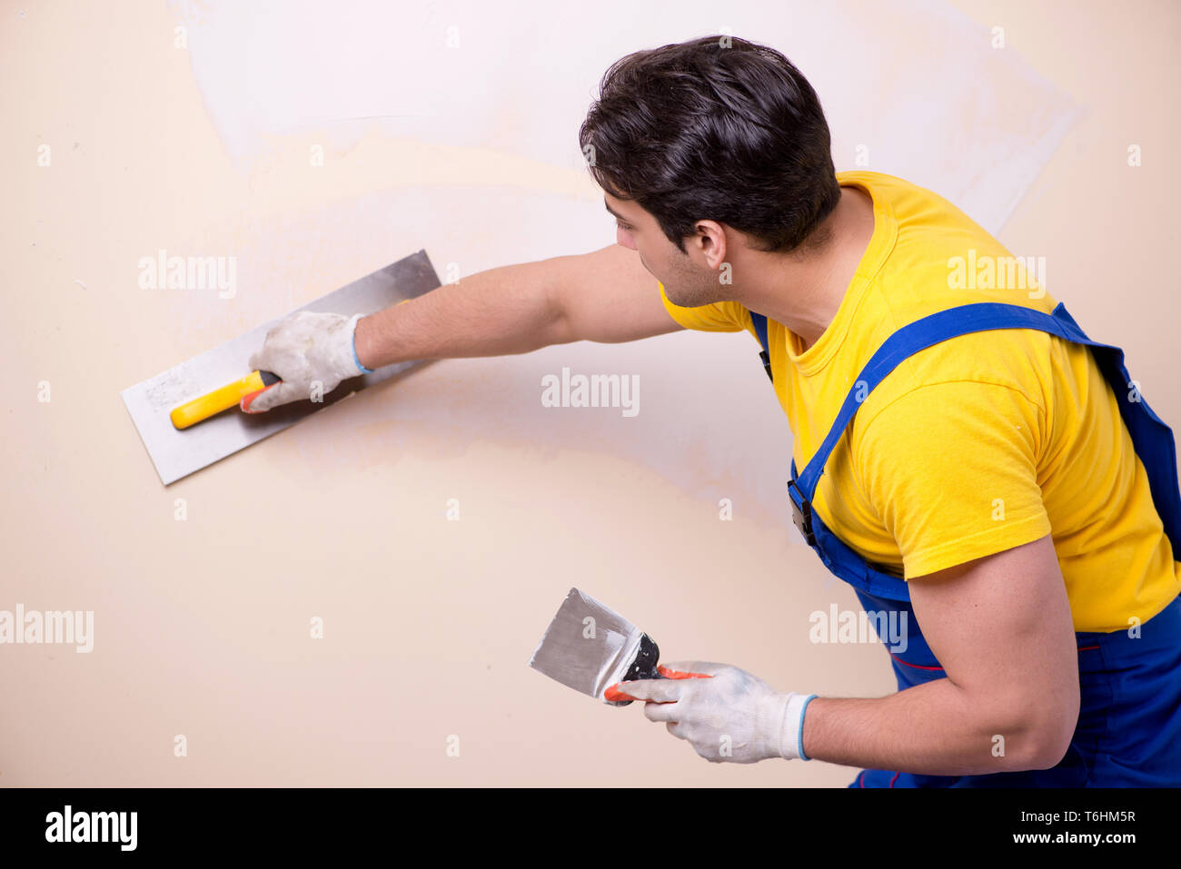 Applying plaster stucco on hi-res stock photography and images - Alamy