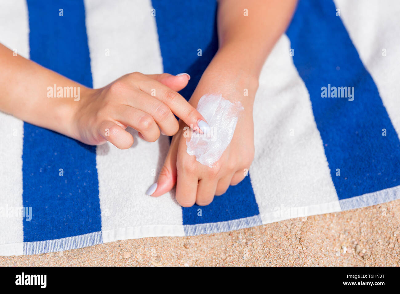 Applying Putting On Sun Tan Lotion High Resolution Stock Photography ...
