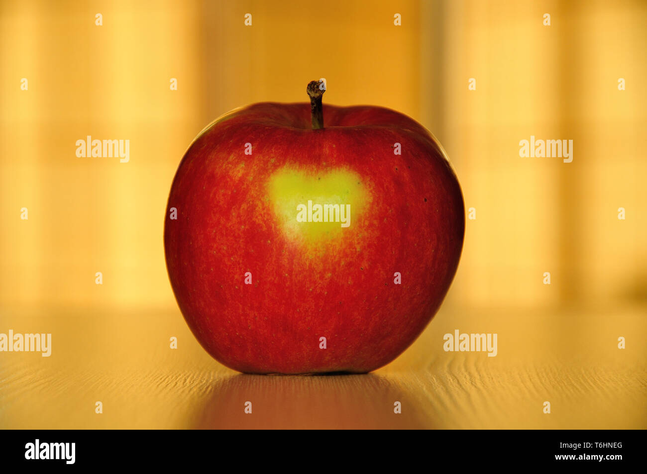 red apple with heart Stock Photo - Alamy