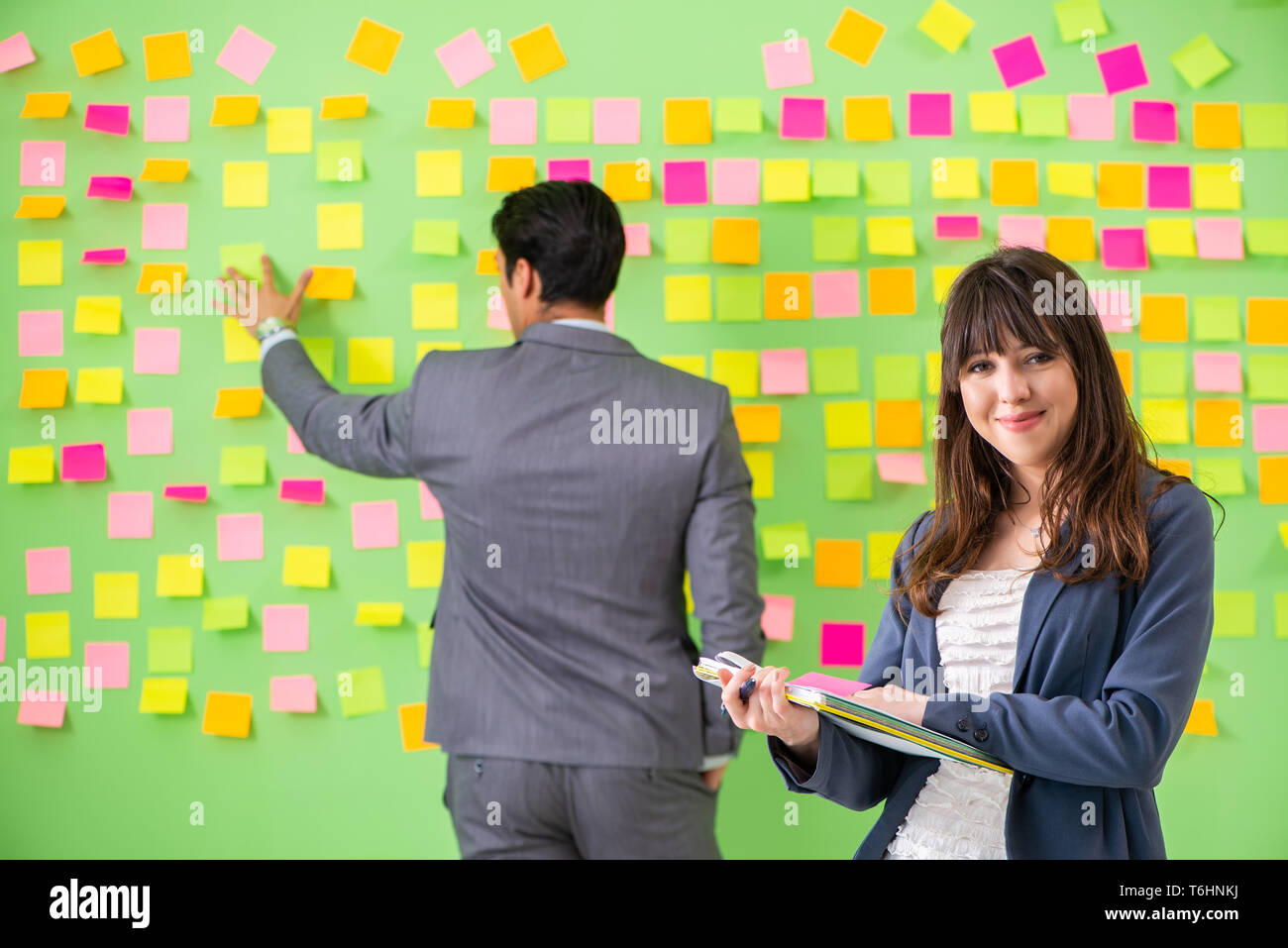 Business colleagues discussing future priorities Stock Photo - Alamy