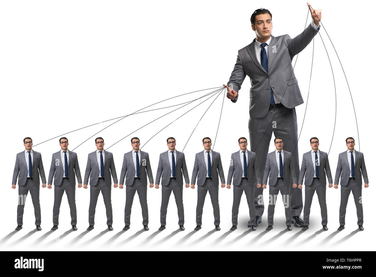 Boss employee manipulating his staff in business concept Stock Photo ...