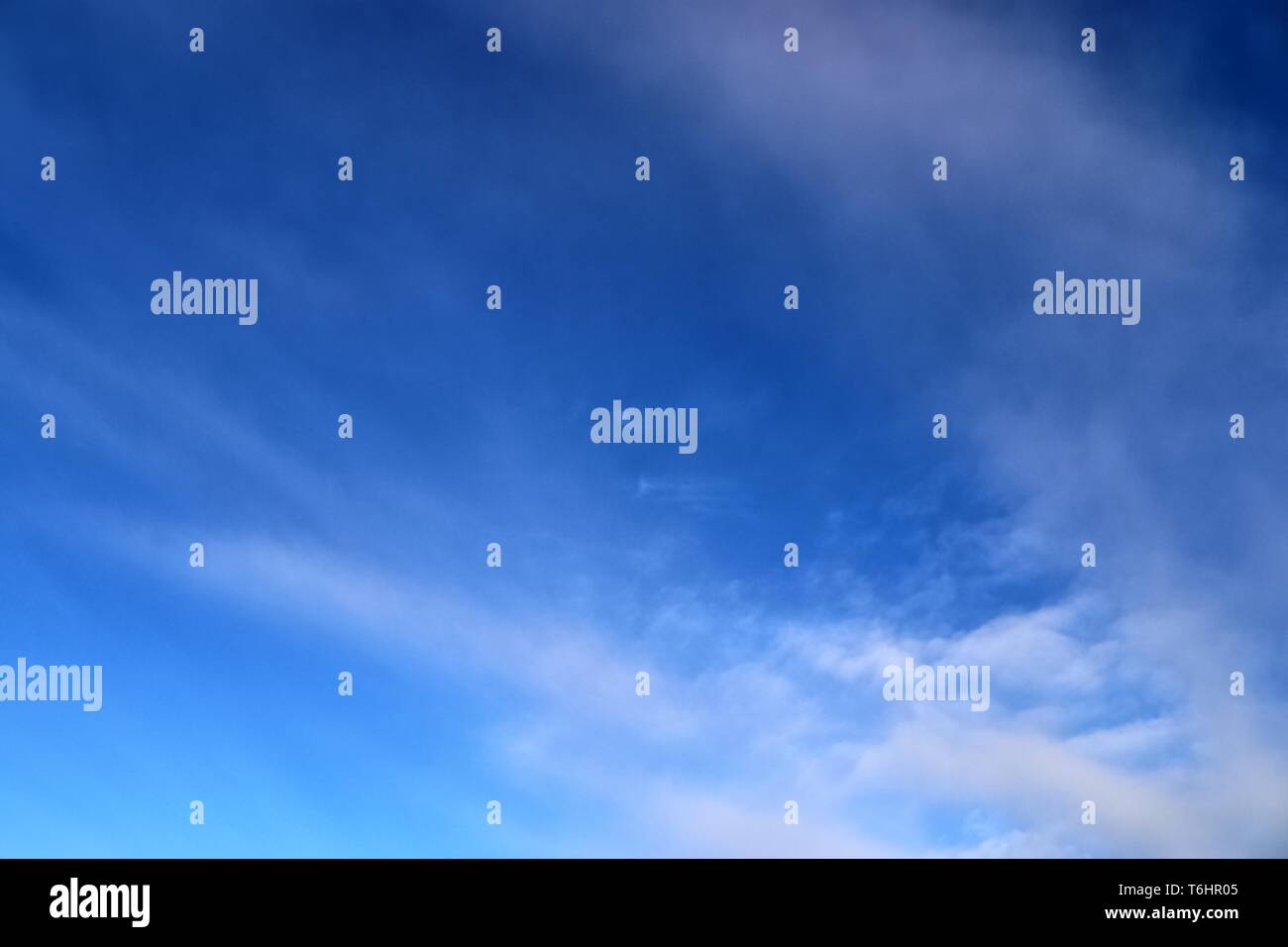 Beautiful mixed cloud formation with white and grey cumulus clouds in ...
