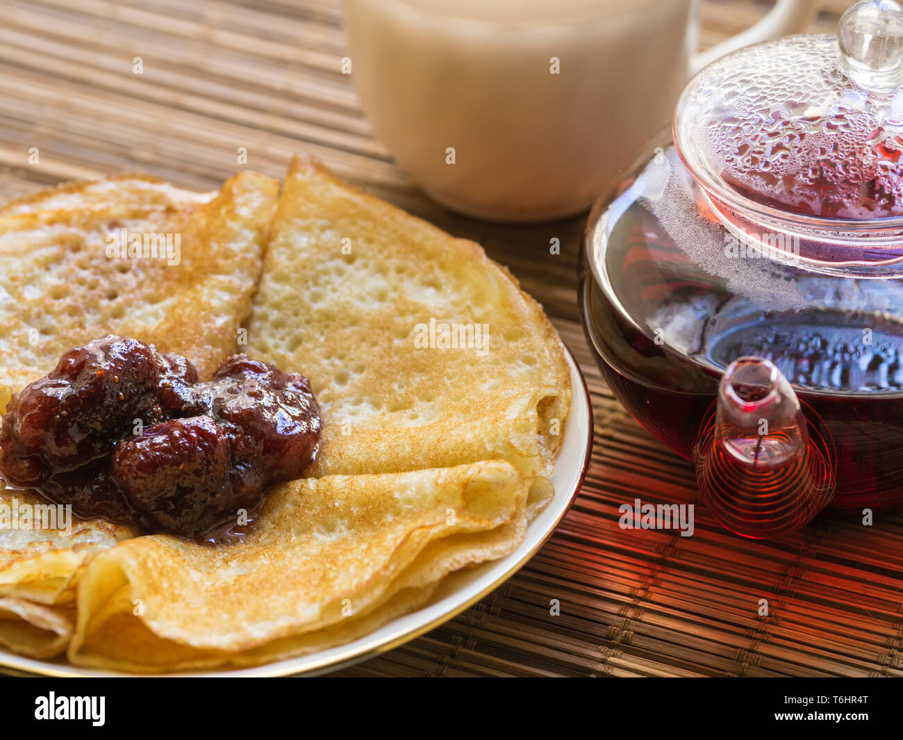 Delicious breakfast Strawberry jam on pancakes Stock Photo - Alamy