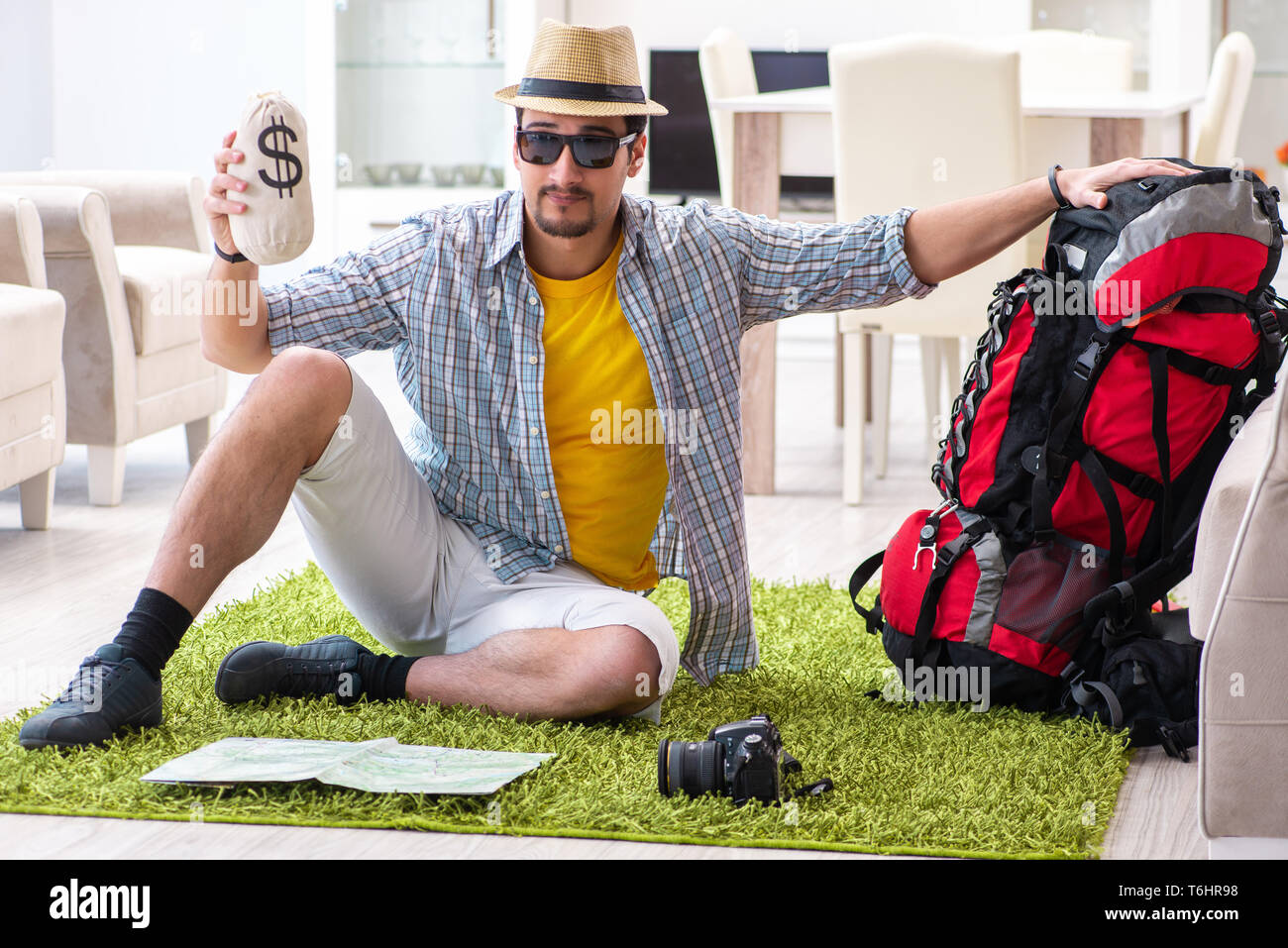 Man planning his travel with map Stock Photo - Alamy