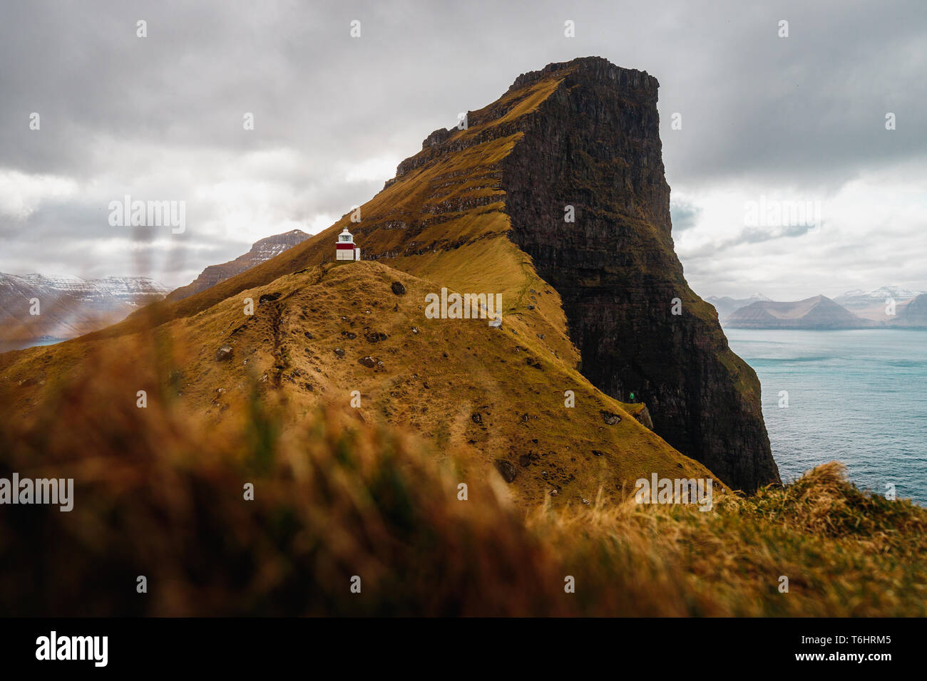 View of picturesque Kallur lighthouse on Kalsoy island with lonely ...