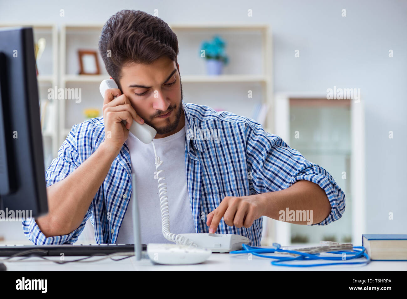 Frustrated young man due to weak internet reception Stock Photo - Alamy