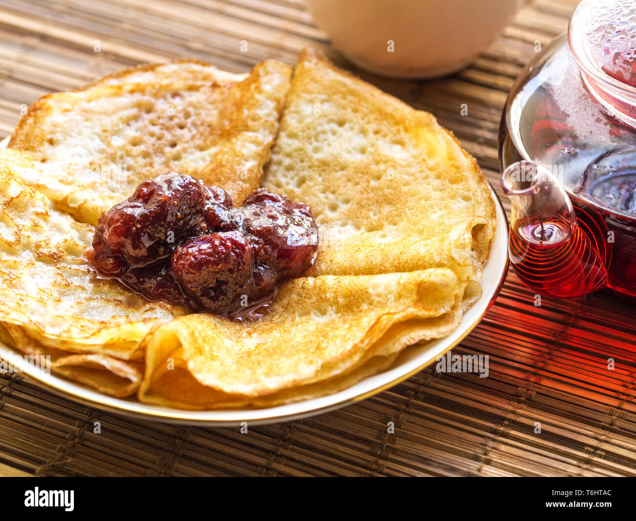 Delicious breakfast Strawberry jam on pancakes Stock Photo - Alamy
