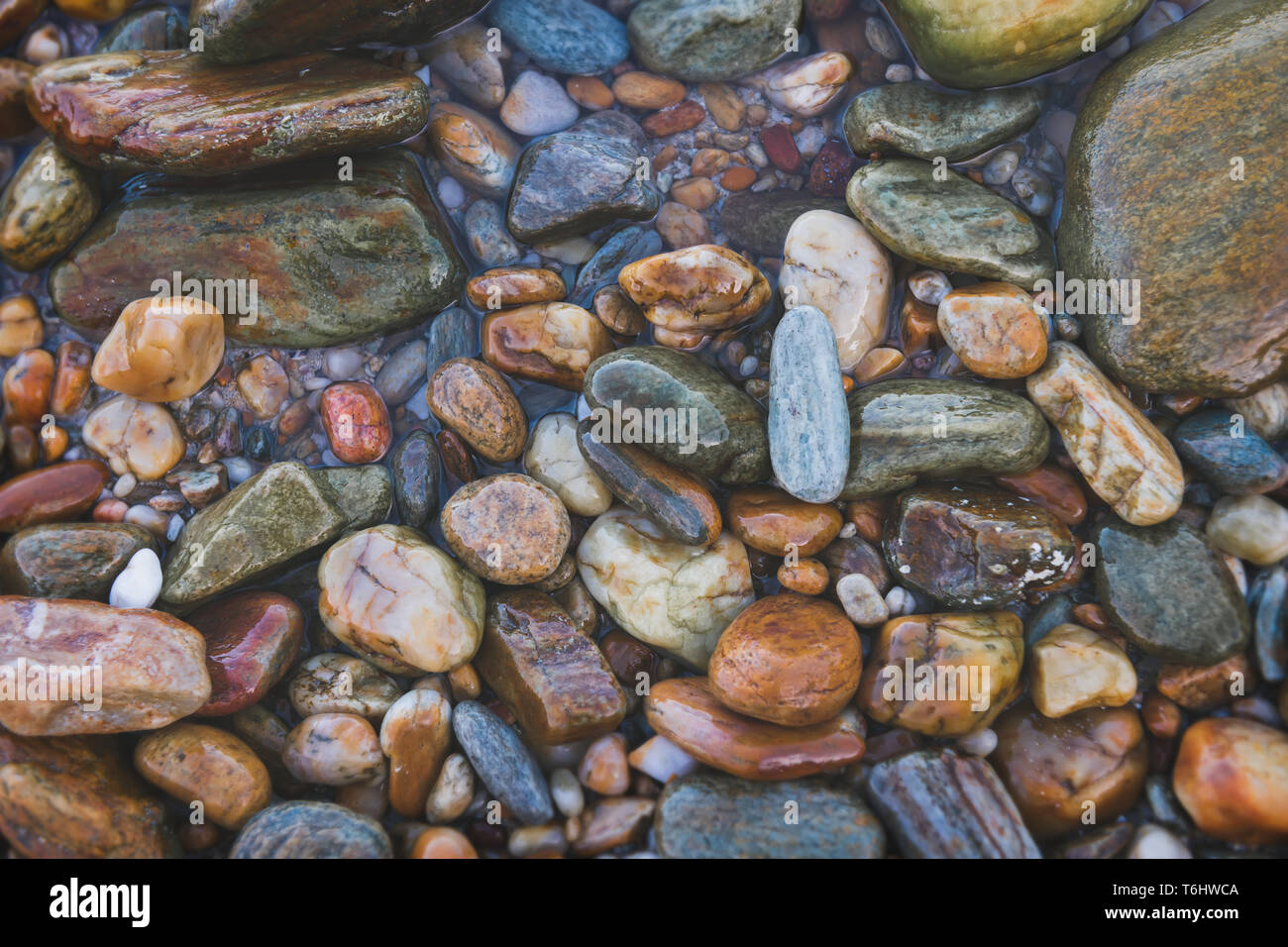 Mix colorful sea rocks background with grey tone color applied concept ...