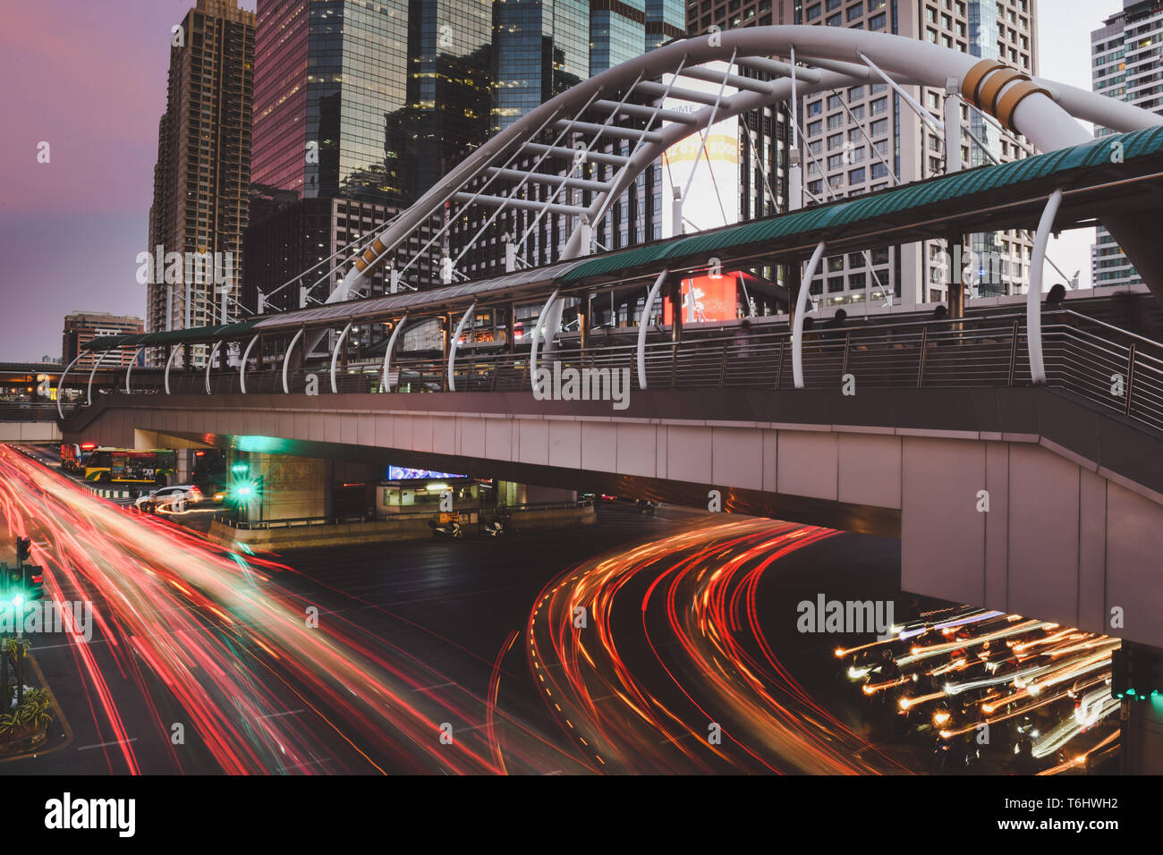 Bangkok downtown traffic lighting in twilight time applied with grey ...