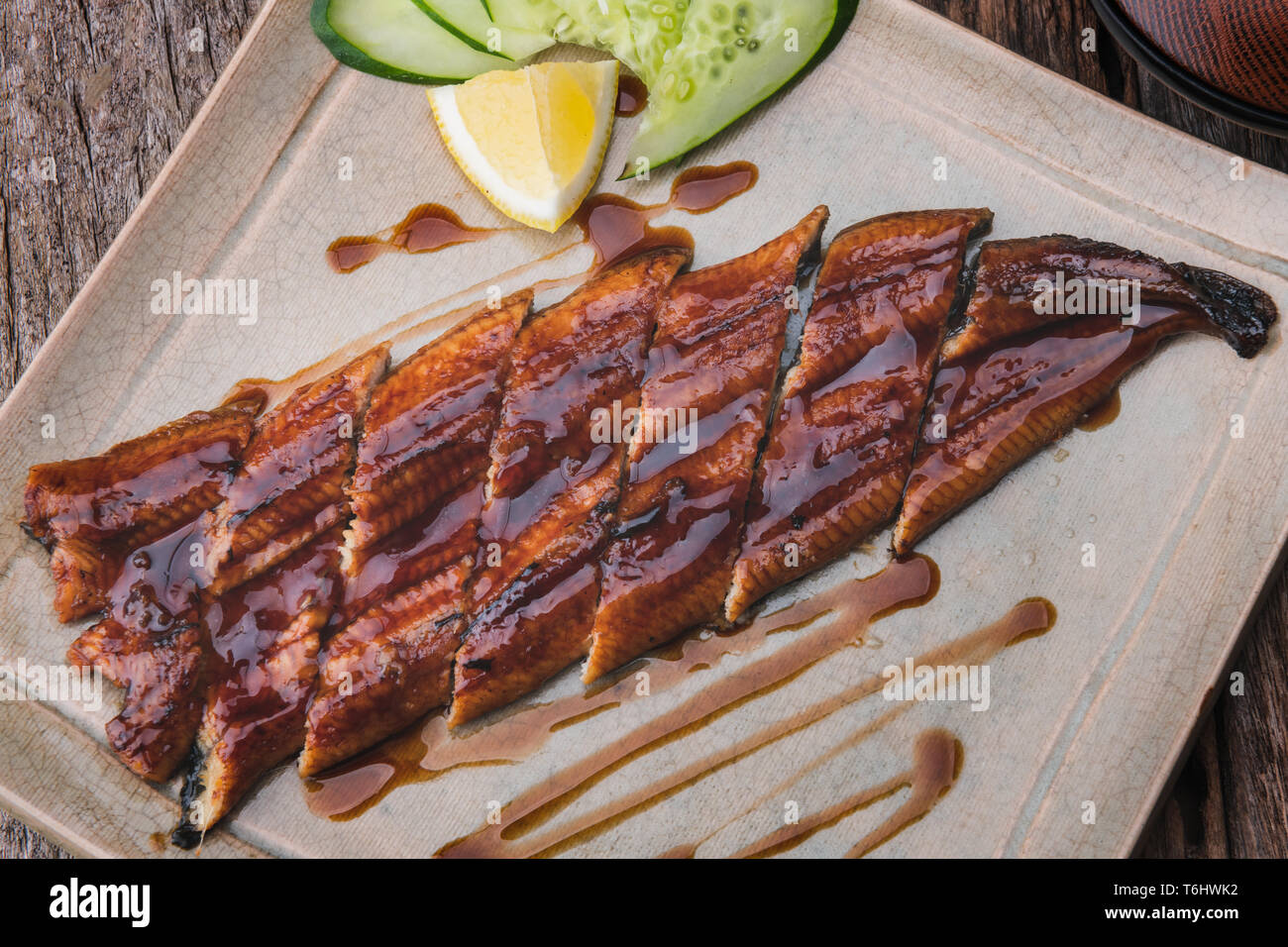 Japanese eel grilled with sweet sauce or unagi kabayaki cut and serve ...