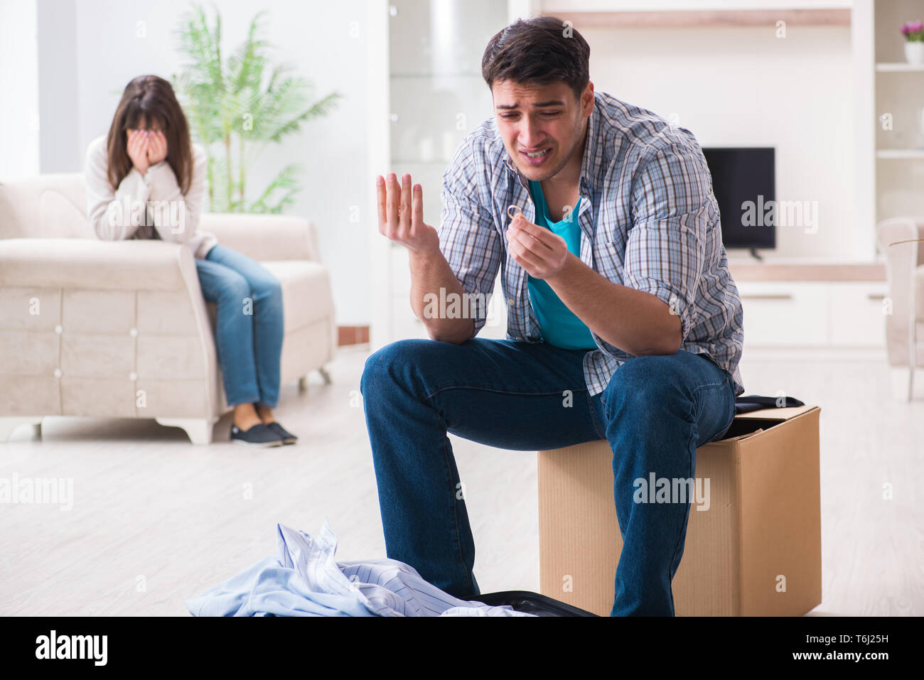 Boyfriend leaving and woman crying hi-res stock photography and images ...