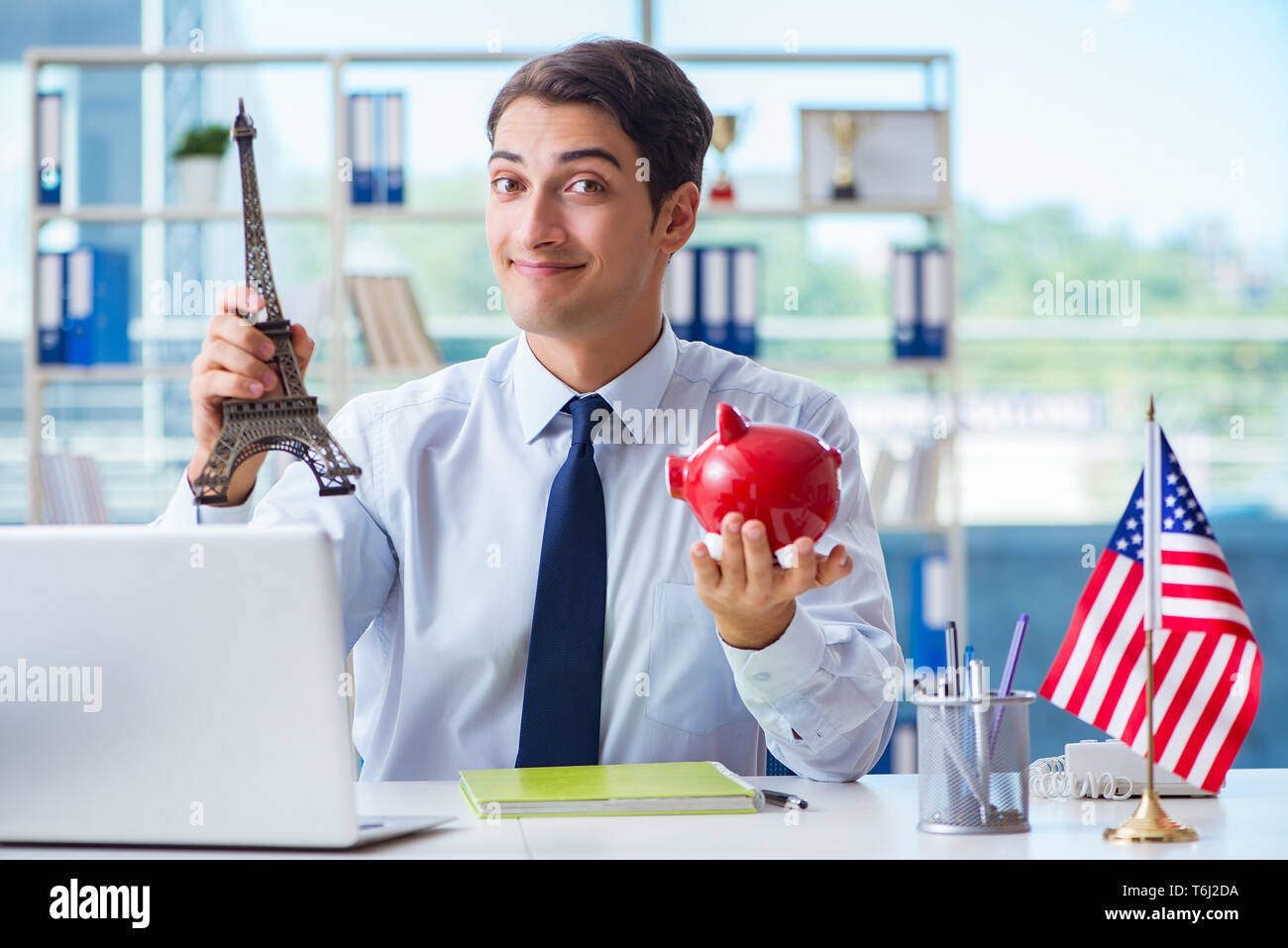 Sales agent working in travel agency Stock Photo - Alamy