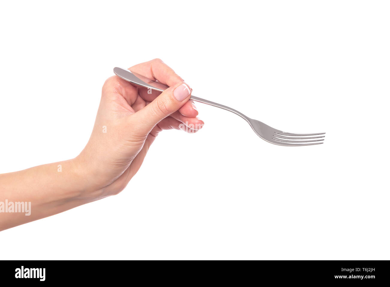 Fork in female hand on white background Stock Photo - Alamy