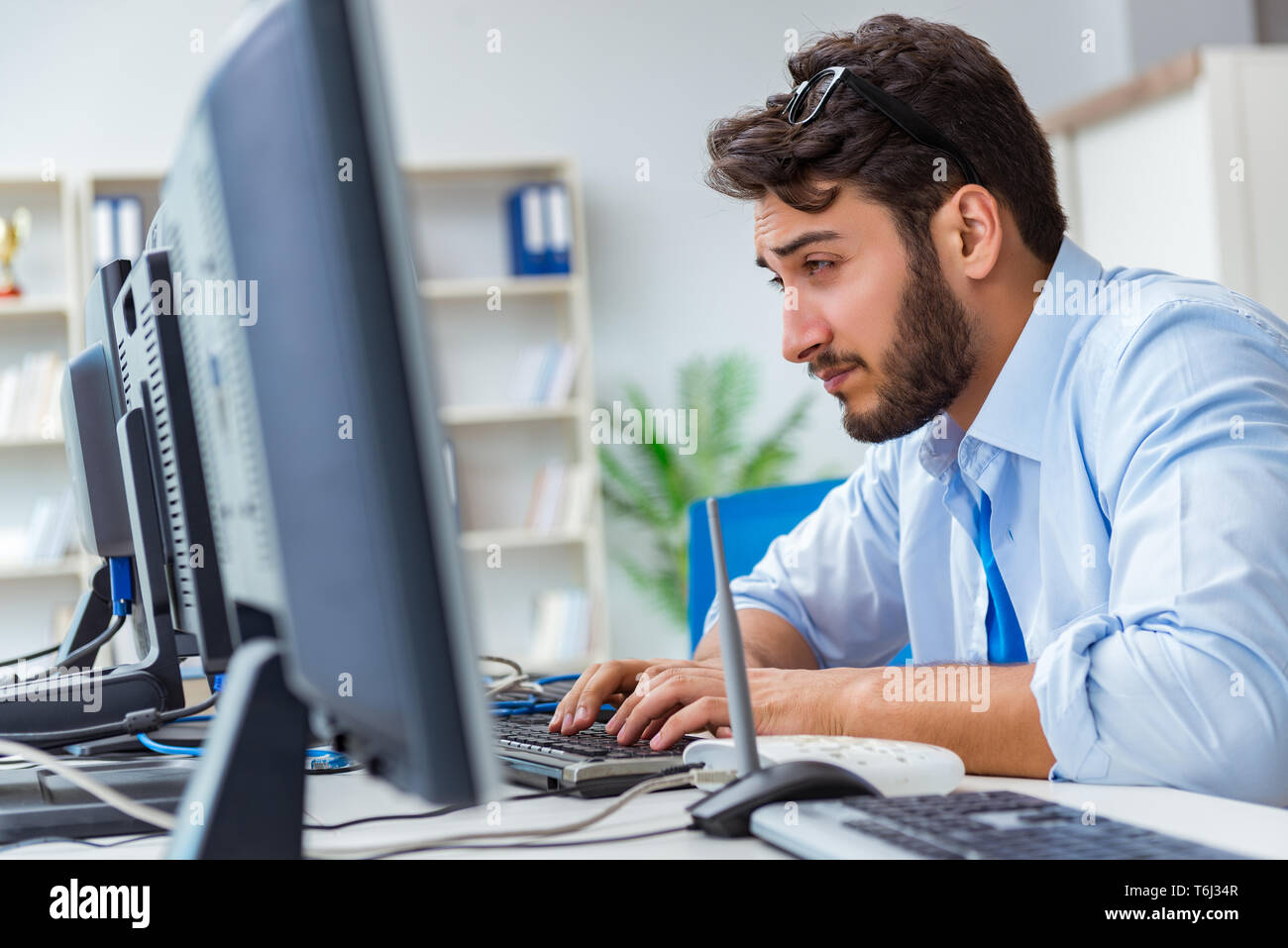 Frustrated young man due to weak internet reception Stock Photo - Alamy